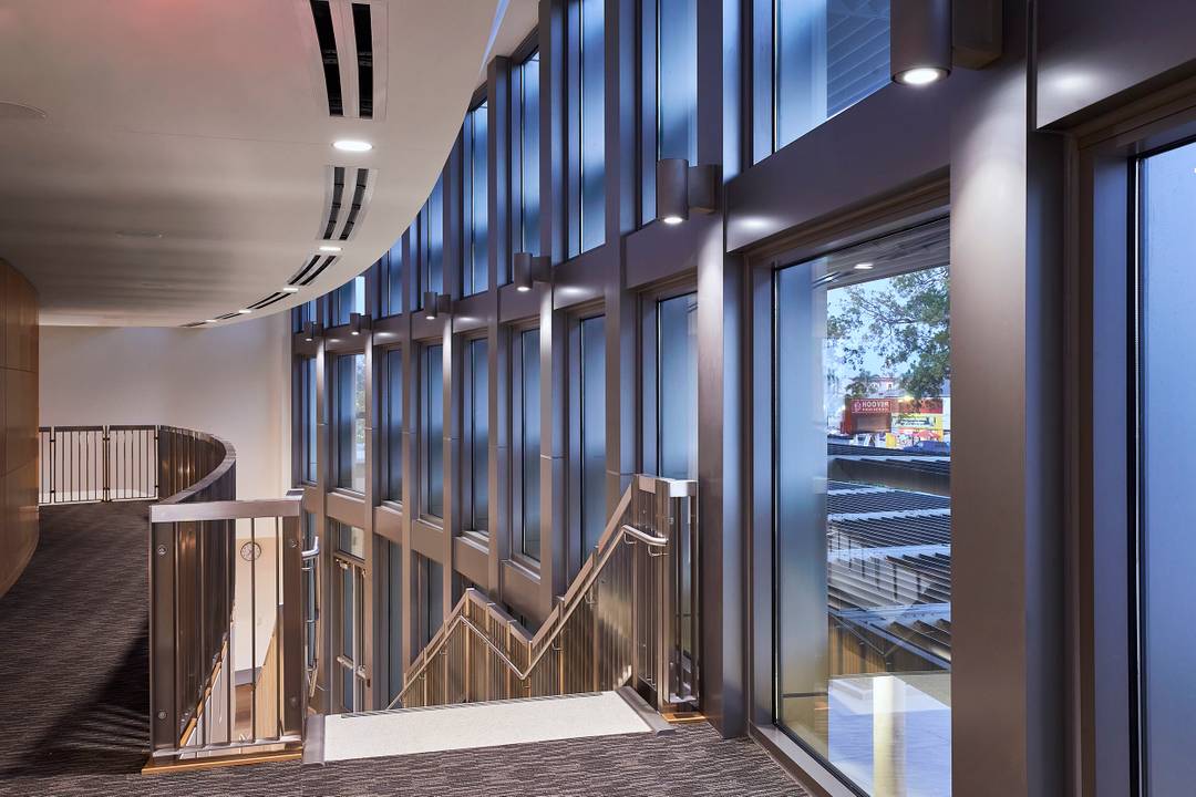 High school lighting design blends modern aesthetic with historic ...